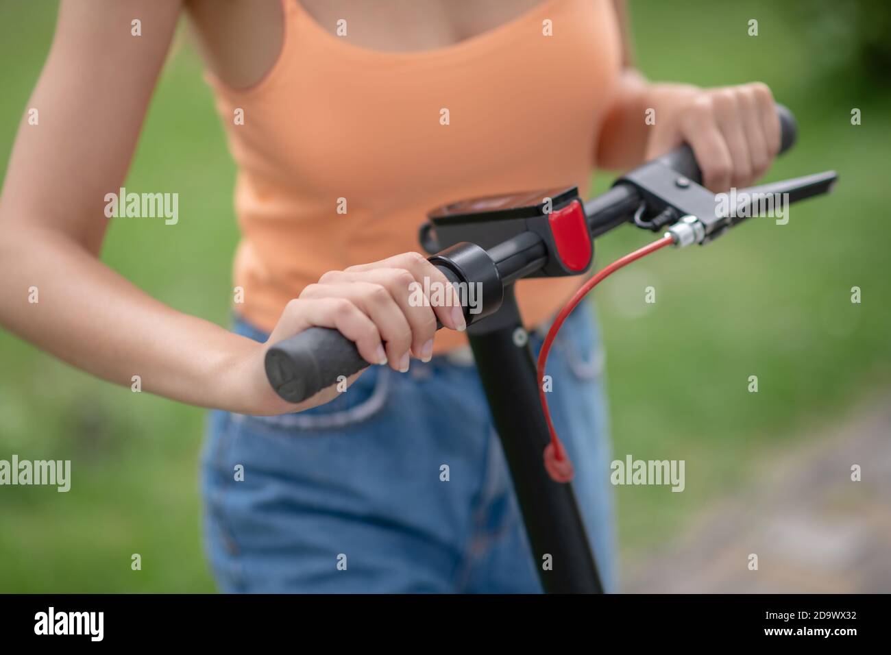 Scooter. Close up picture of womans hand holding a handlebar Stock ...