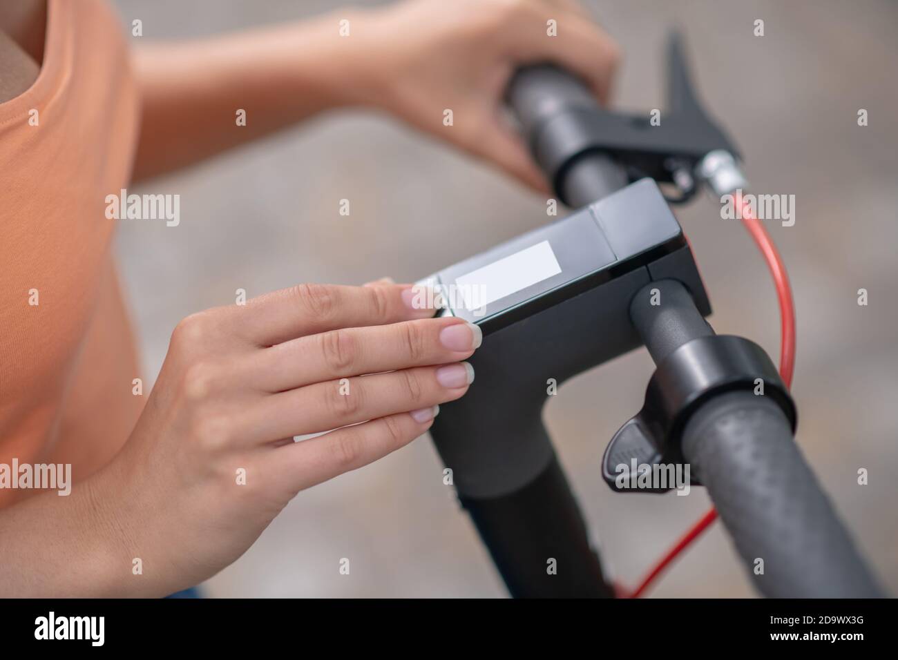Hands on handlebar of scooter hi-res stock photography and images - Alamy