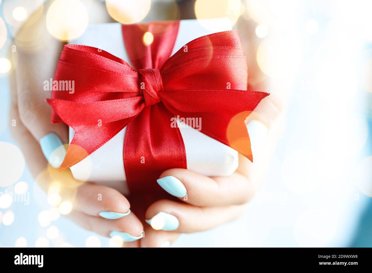 Giving red gift box hi-res stock photography and images - Alamy