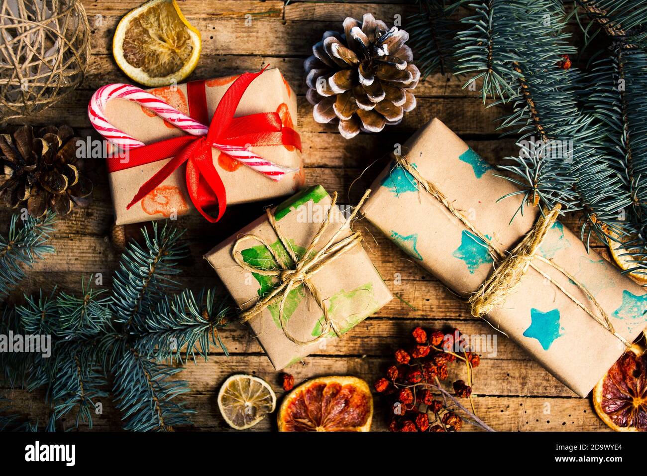 Wrapped Christmas presents and decorations top view Stock Photo - Alamy