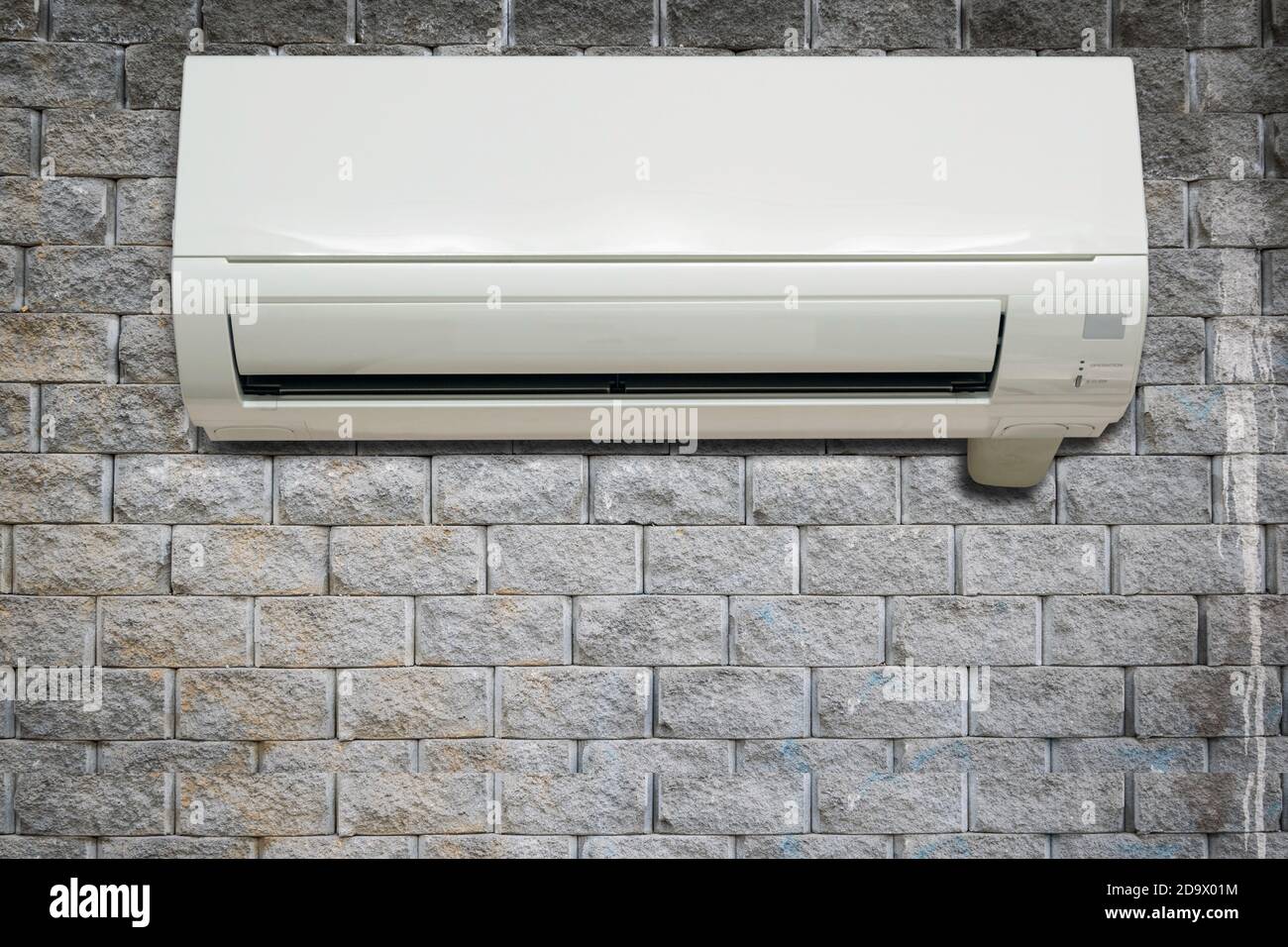 Wall air conditioning hanging on a brick wall in the bedroom Stock ...