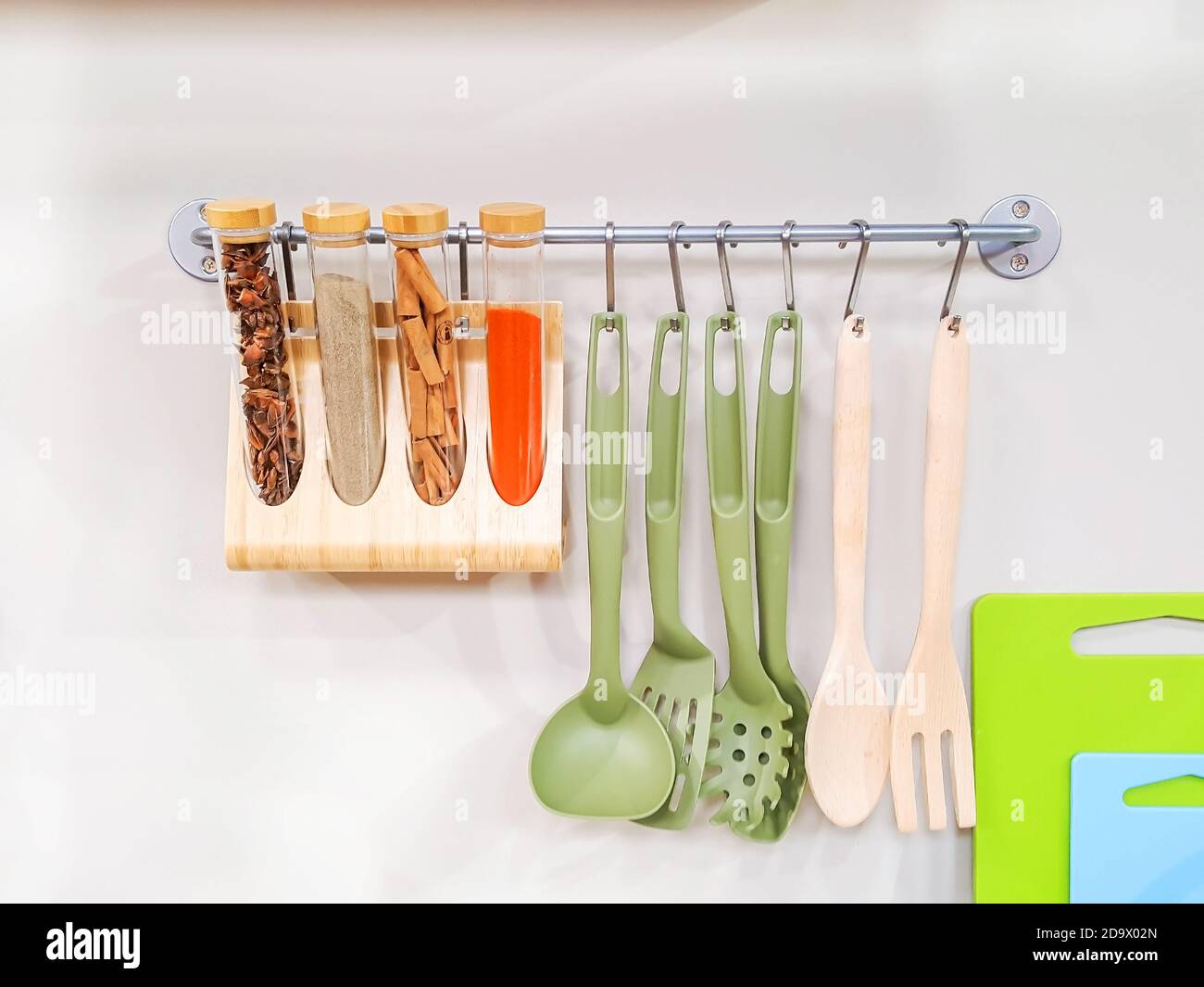 Modern design of the kitchen tools hanging on wall in the kitchen room ...