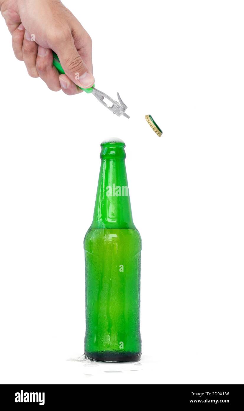 Hands are opening a beer bottle with a device for opening the bottle ...