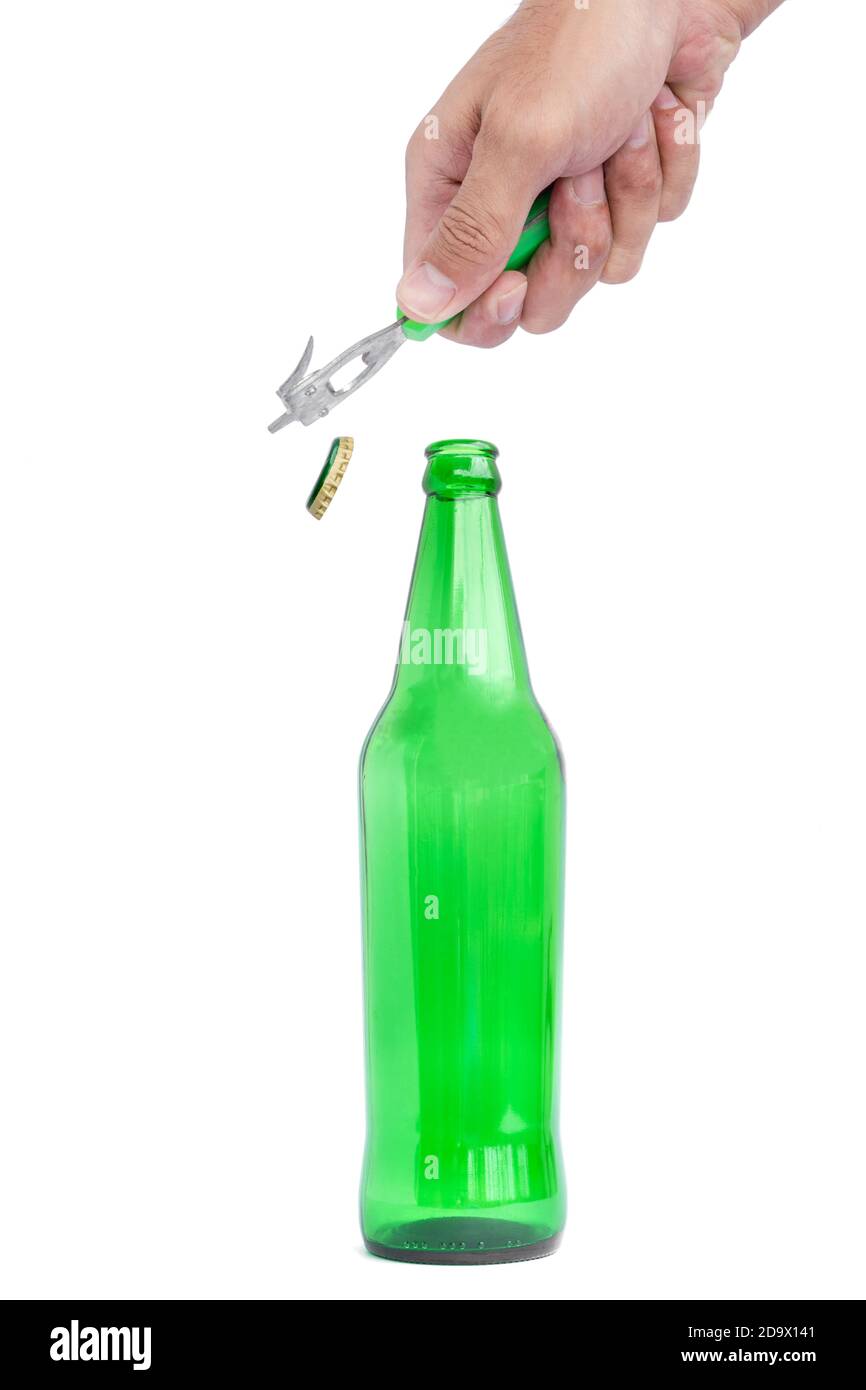 Hands are opening a beer bottle with a device for opening the bottle ...