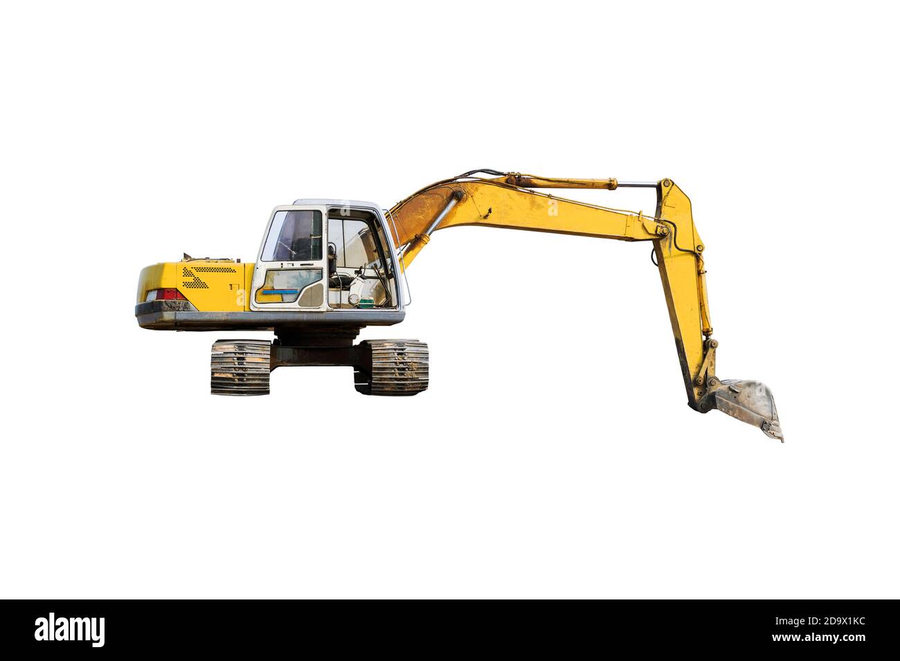 Excavator bucket on sand Cut Out Stock Images & Pictures - Alamy