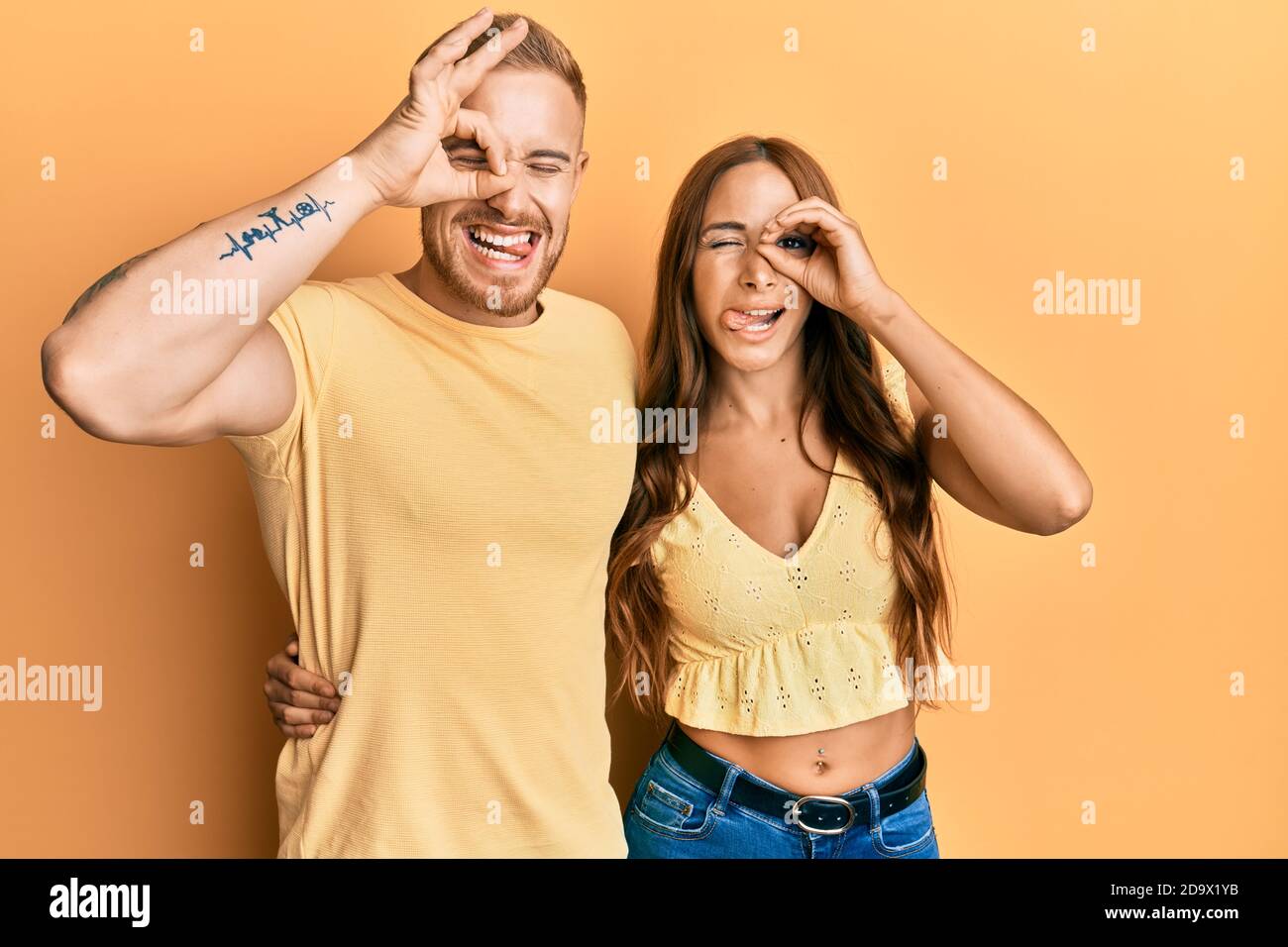 Young couple of girlfriend and boyfriend hugging and standing together ...