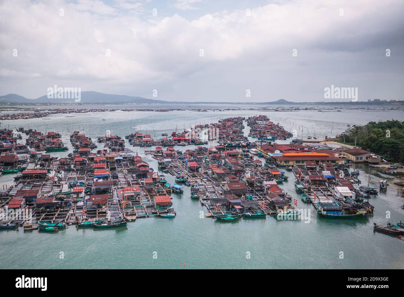 Lingshui, Hainan, China - Nov 13, 2019. Floating local Fishing Village ...