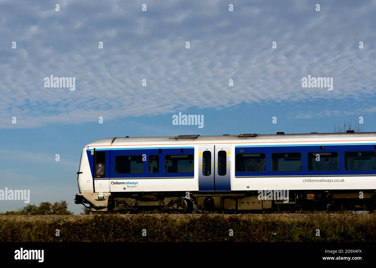 A Chiltern Railways class 165 diesel train, side view, Warwickshire, UK ...