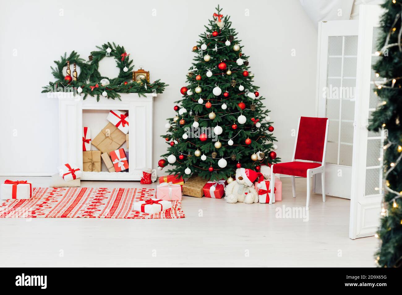 New Year's Eve Christmas Tree With Gifts Stock Photo - Alamy