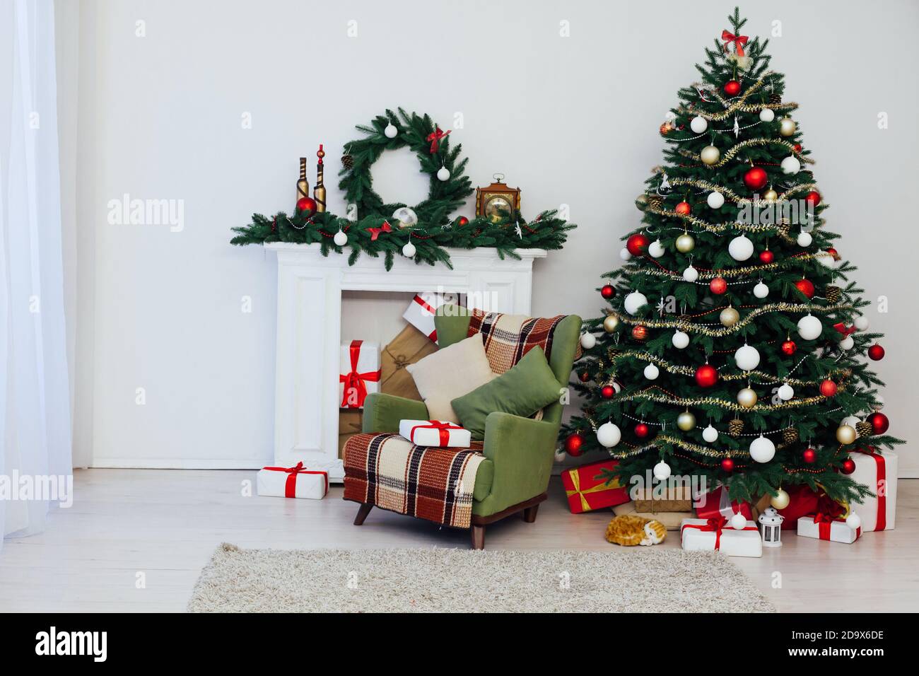 New Year's Eve Christmas Tree With Gifts Decor Stock Photo - Alamy