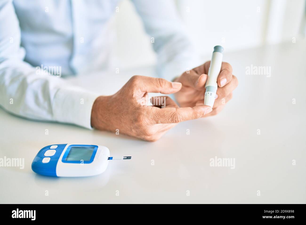 Close up of man with diabetes using insuline stick with syringe Stock ...