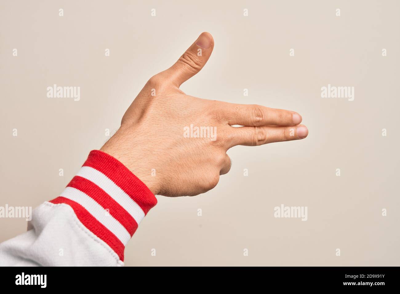 Hand of caucasian young man showing fingers over isolated white ...