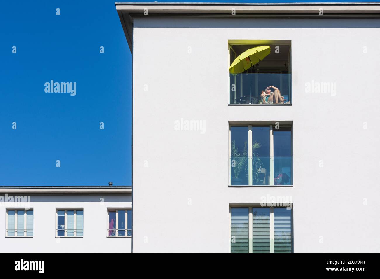 Binz: Koloss von Prora (Colossus of Prora), sunbathing woman, Ostsee ...