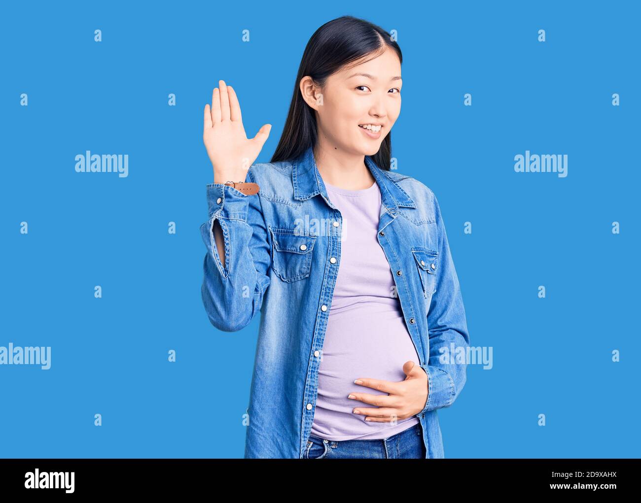 Woman baby wave goodbye hi-res stock photography and images - Alamy