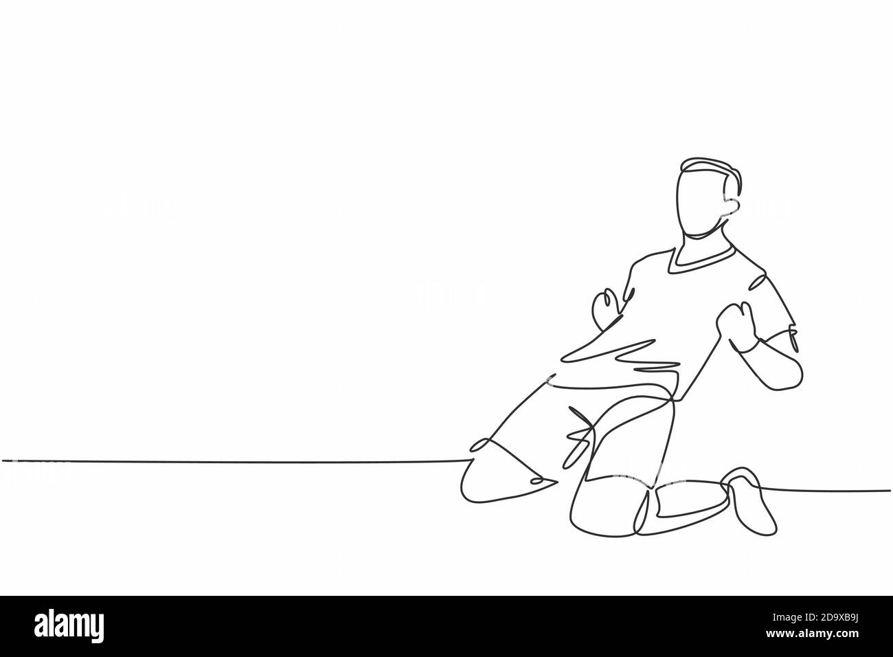 One continuous line drawing young sporty soccer player sliding on the ...