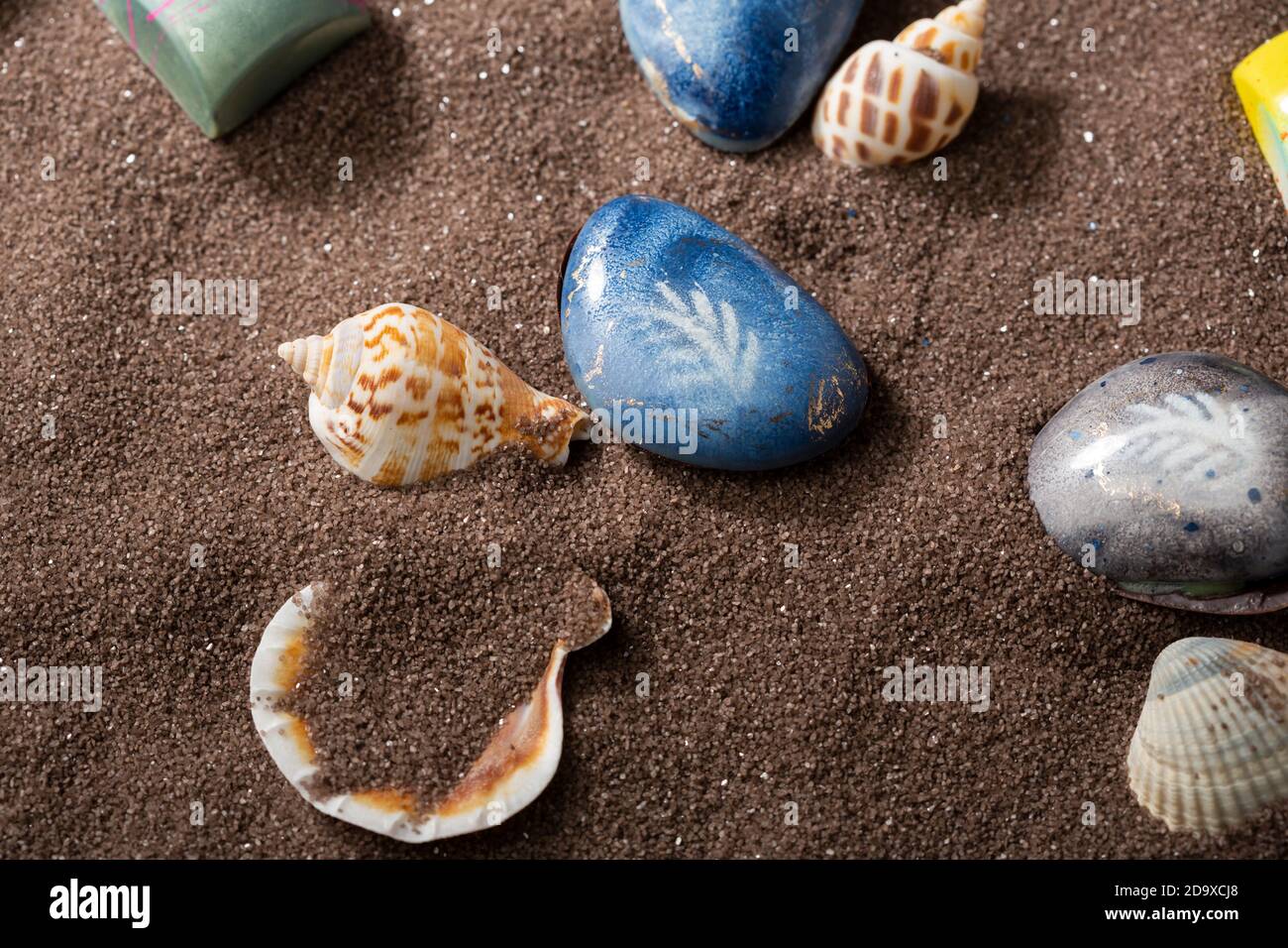 Chocolate candies and sea shells Stock Photo - Alamy