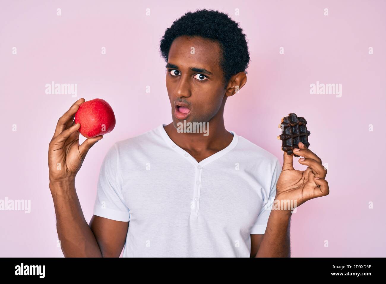 Portrait man apple in mouth hi-res stock photography and images - Alamy