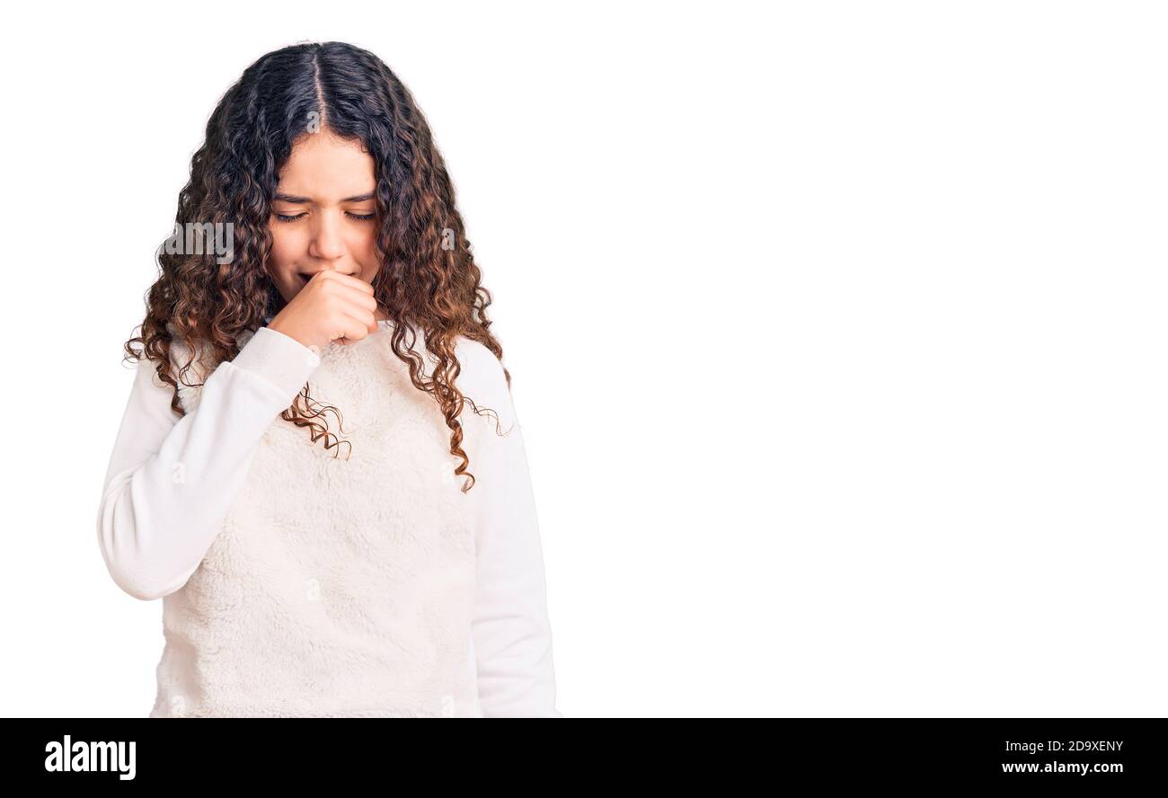 Beautiful kid girl with curly hair wearing casual clothes feeling ...