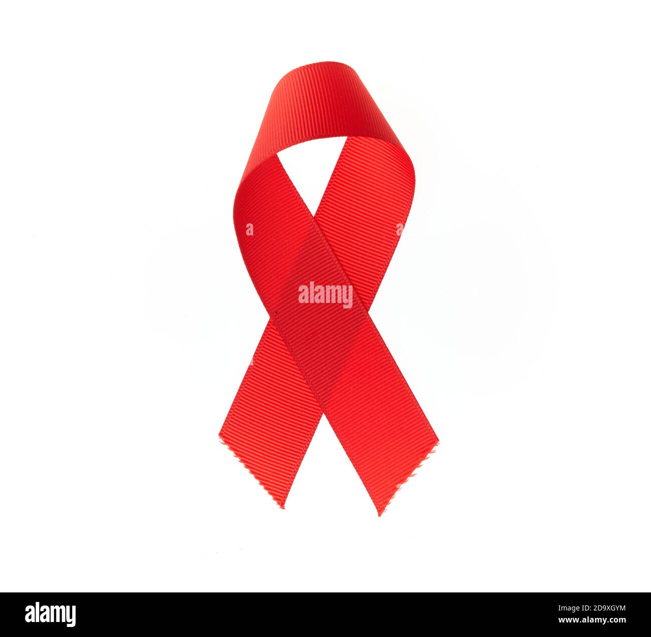 Red hiv awareness ribbon over isolated white background Stock Photo - Alamy