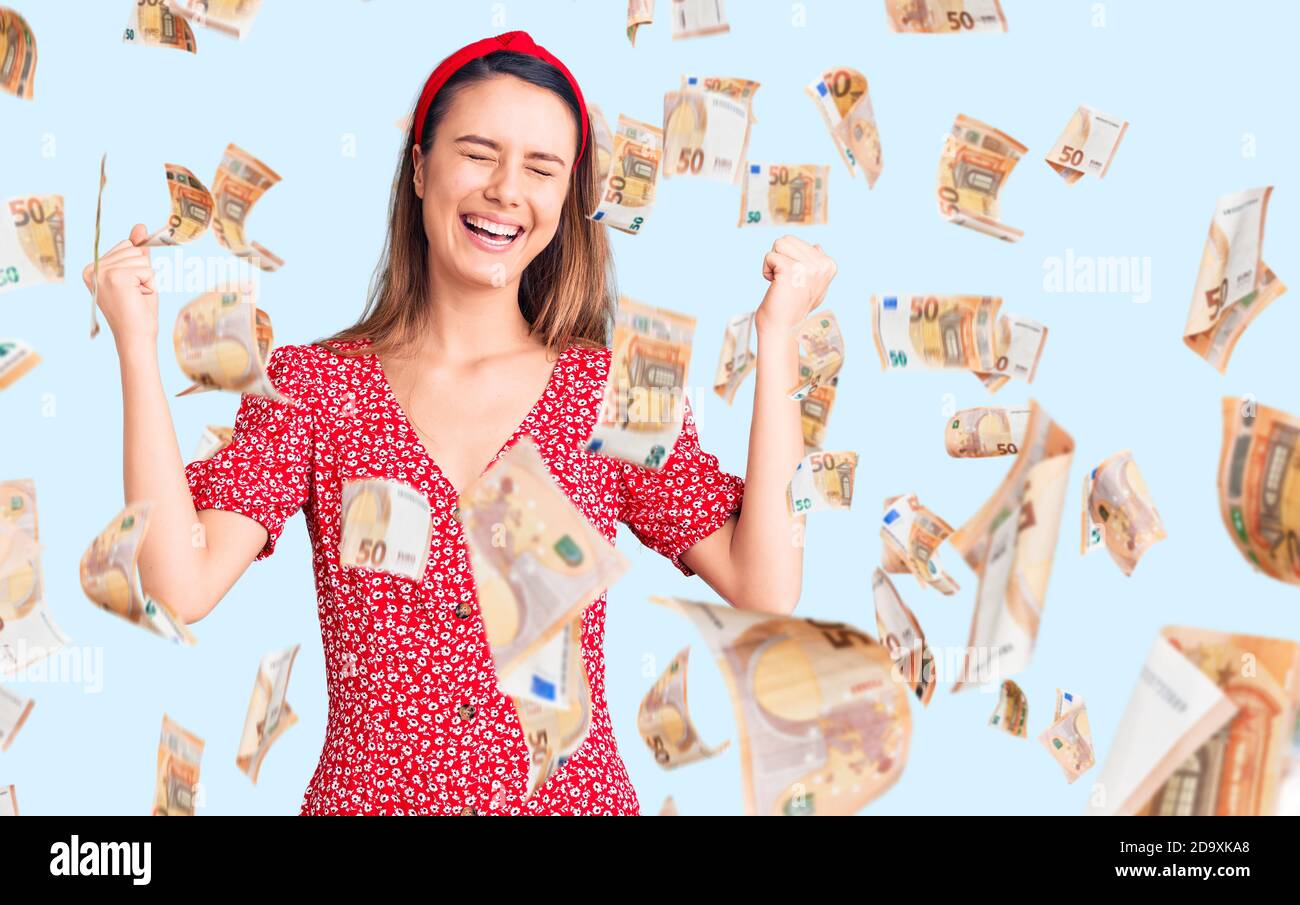 Young beautiful girl wearing dress and diadem very happy and excited ...