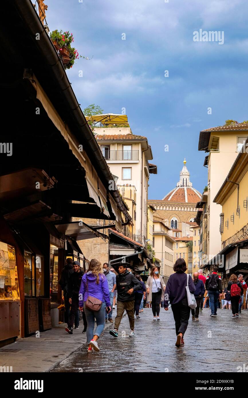 Tourists in Ponte Vecchio over Arno River - Florence, Tuscany, Italy ...