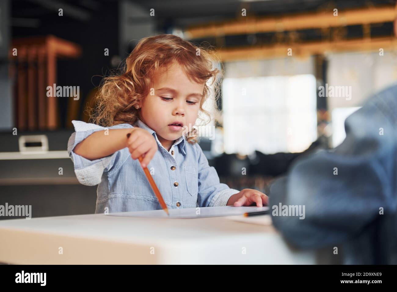 Children have fun in playroom. Kindergarten educational games Stock ...