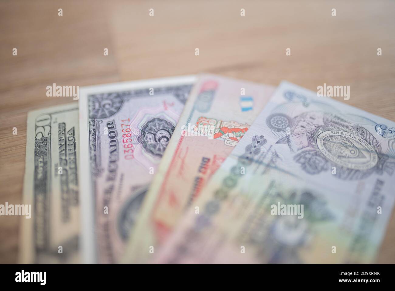 Twenty-Dollar, Five Sucres, Ten Quetzales, and Five Lempiras Bills on a ...