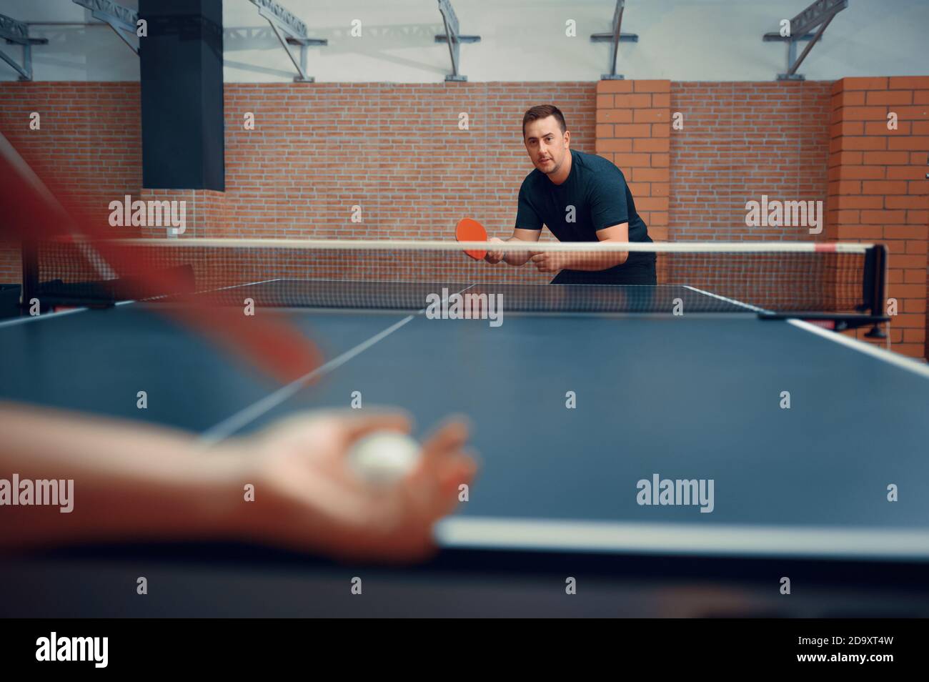Table tennis, male and female ping pong players Stock Photo - Alamy