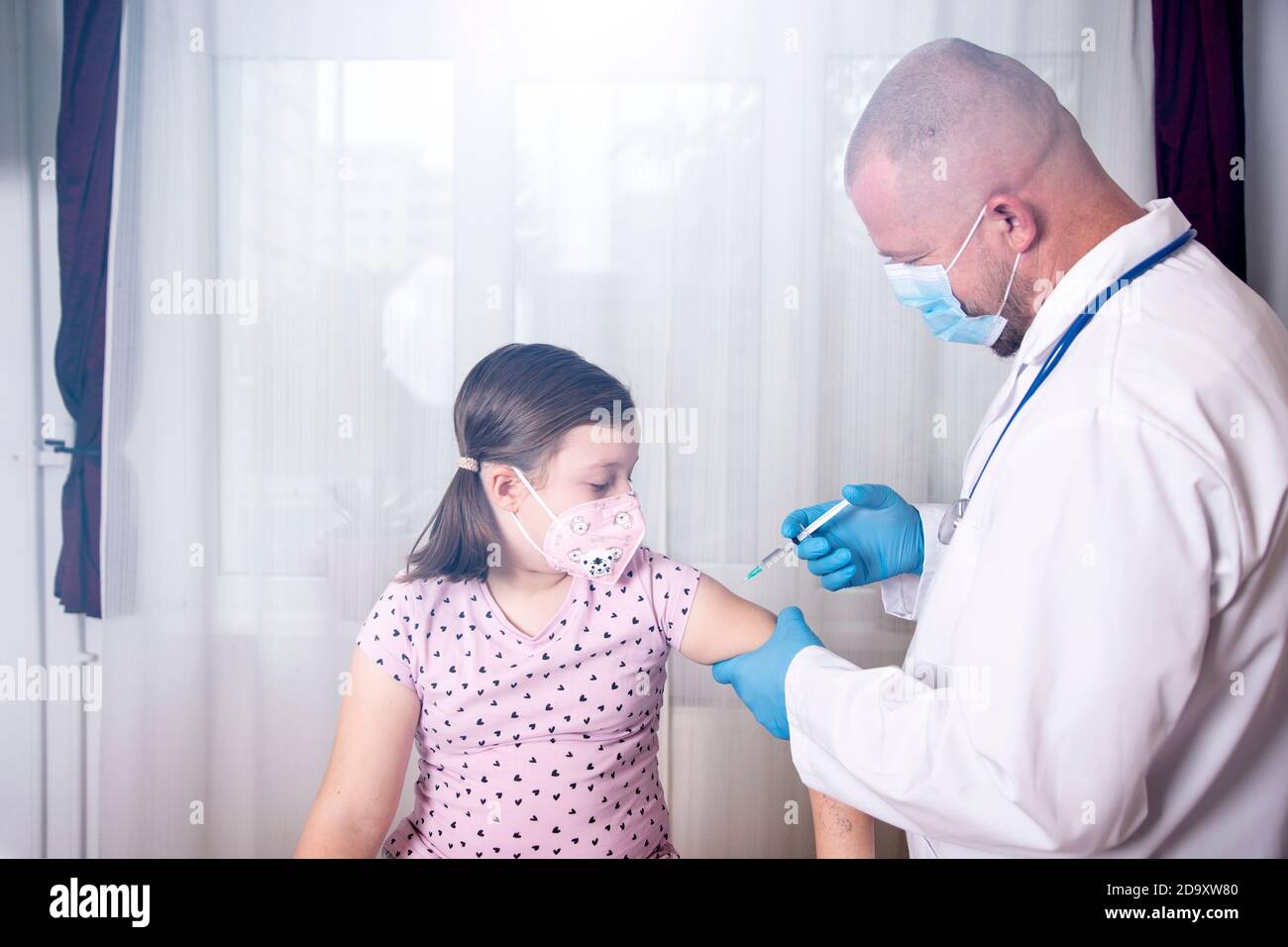 Children vaccinating immunization concept. Doctor injecting vaccination ...
