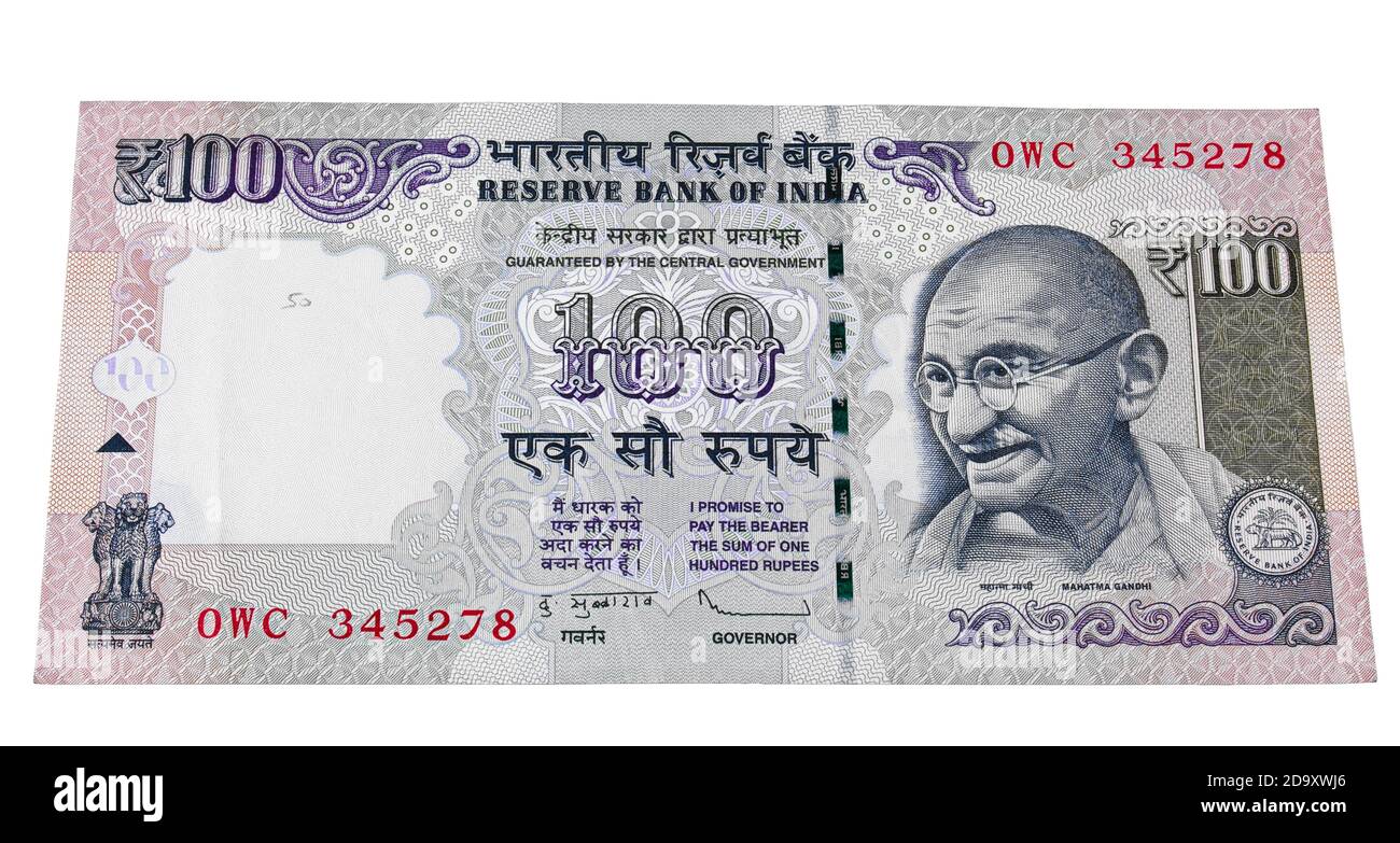 Indian 100 rupee banknote isolated on white background. Rupee is the official currency of the ...