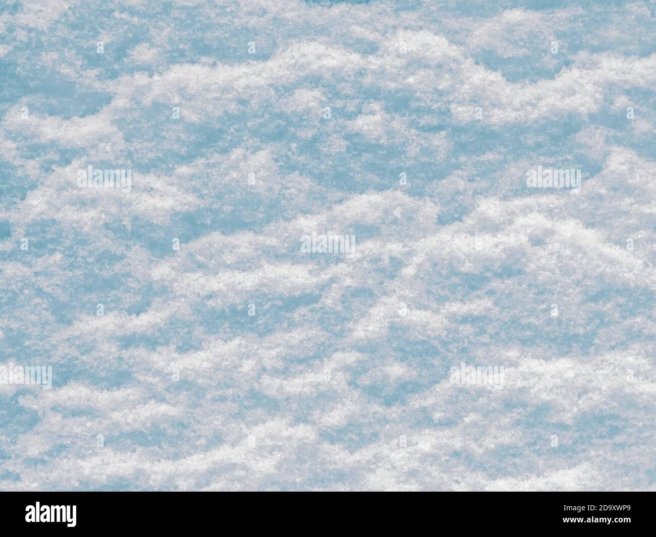 Blue fresh new snow surface closeup texture, background Stock Photo - Alamy
