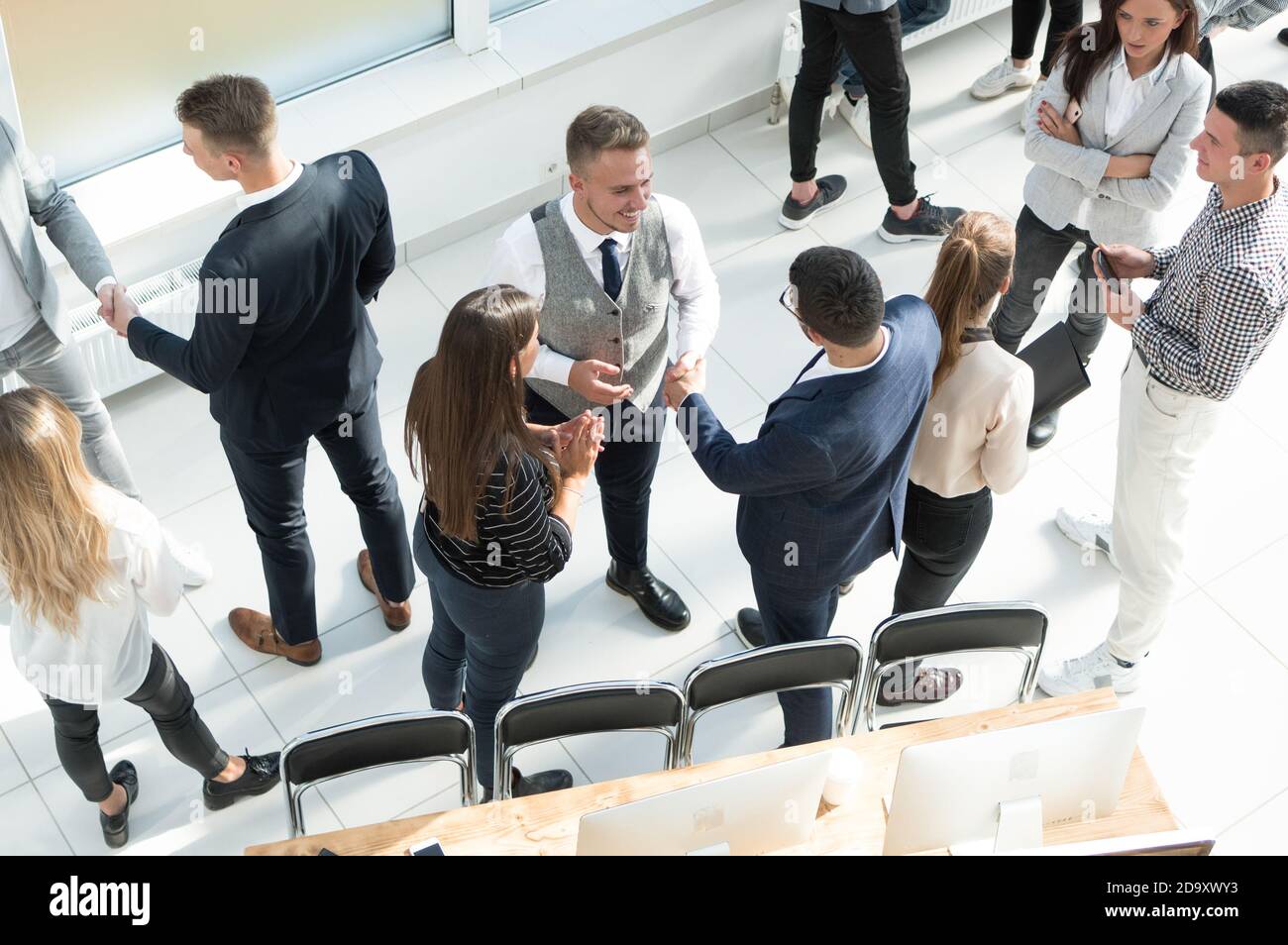 top view. group of young employees at the workplace in the office Stock ...