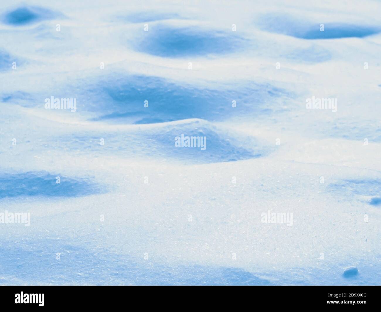 Blue bumpy mound snow surface background, shallow depth of field Stock ...