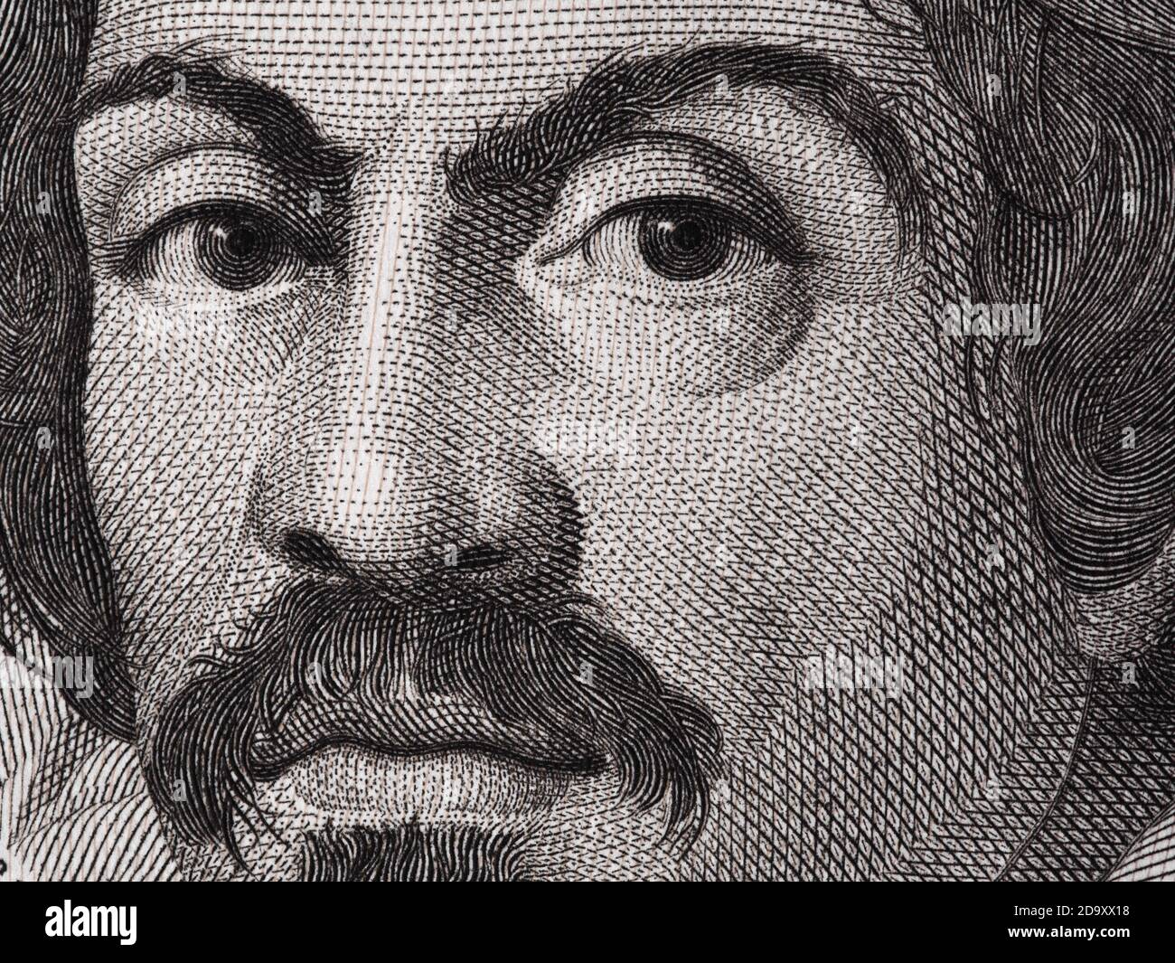 Caravaggio portrait on 100000 italian lire banknote closeup macro. One ...