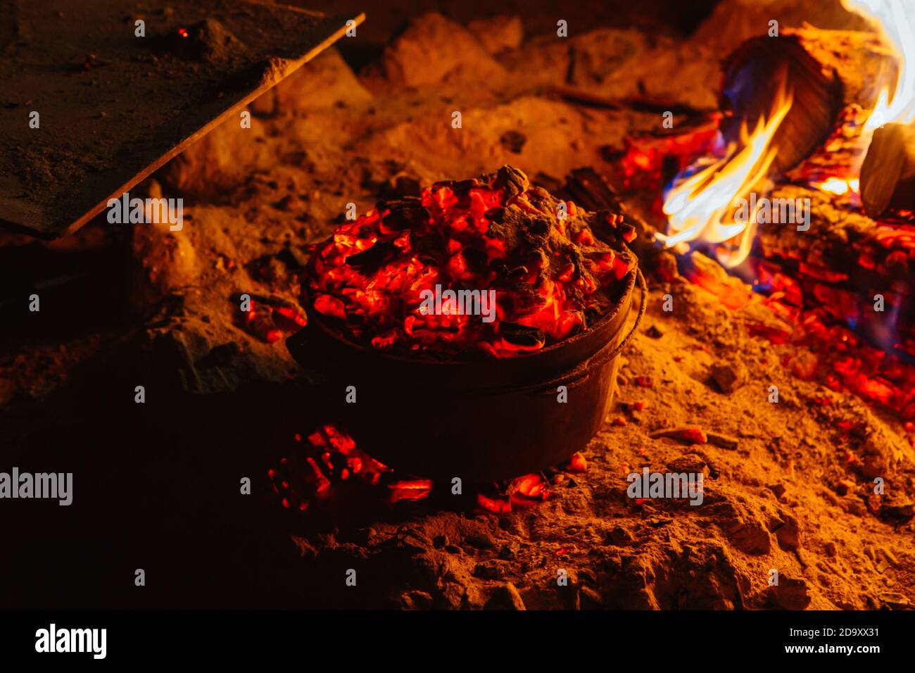 Cooking Damper on a Fire in Australia Stock Photo - Alamy