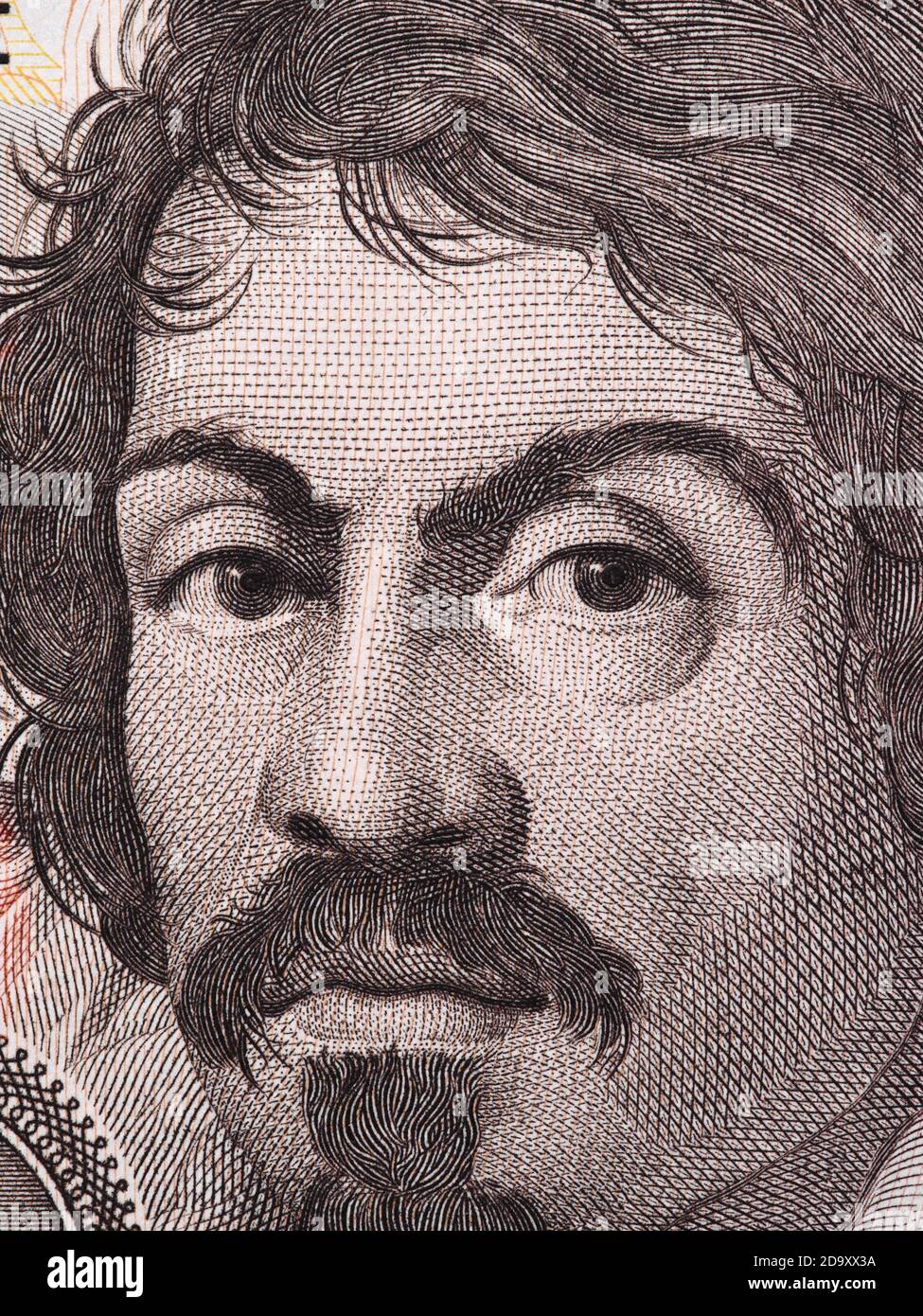 Caravaggio face on 100000 italian lire banknote close up. One of the ...