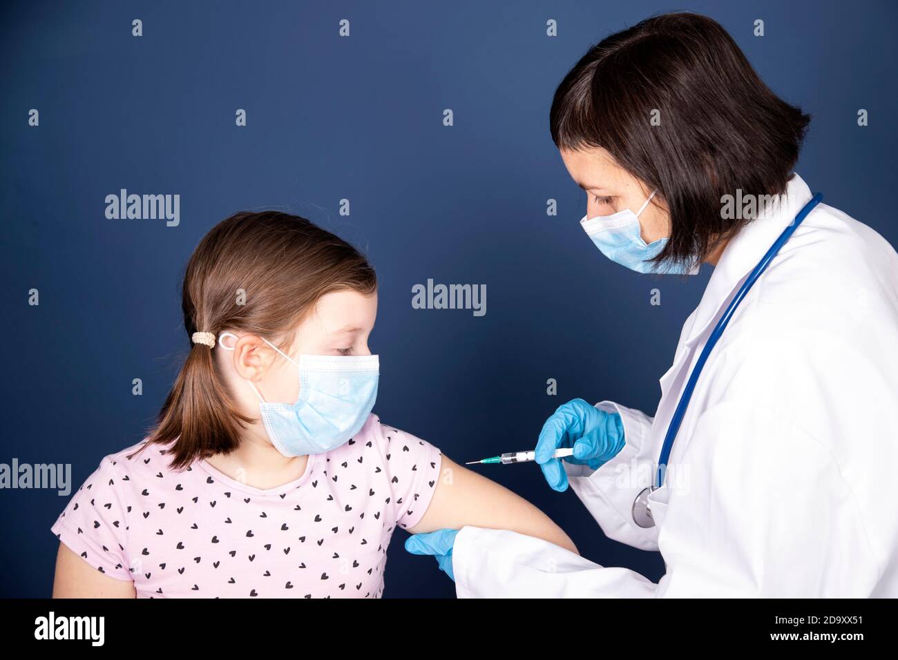 Children vaccinating immunization concept. Doctor injecting vaccination ...