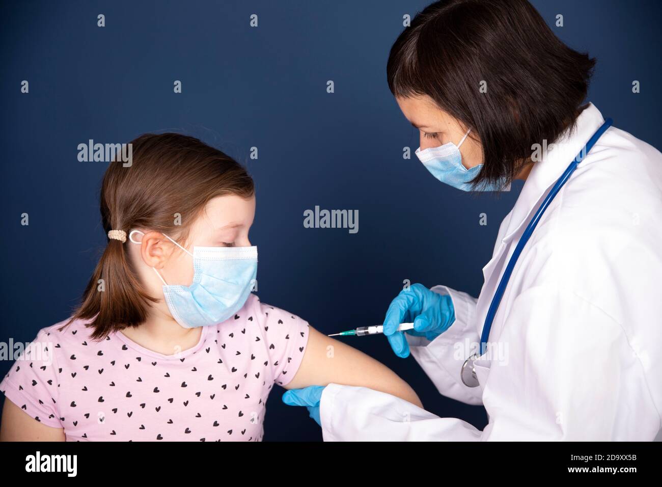 Children vaccinating immunization concept. Doctor injecting vaccination ...