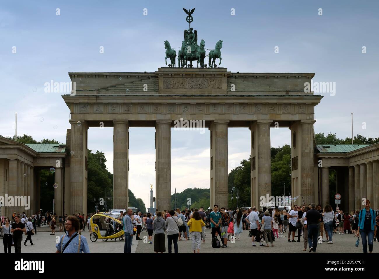 People walking near the Brandenburg gate. Constructed between 1788 and ...