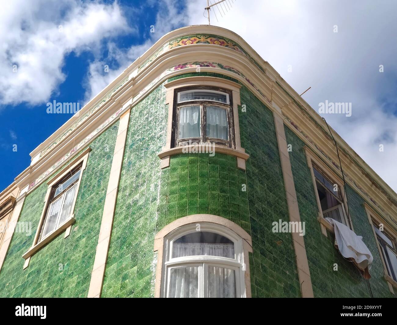 The beauty of Portugal - famous green tiled building in Lagos with ...