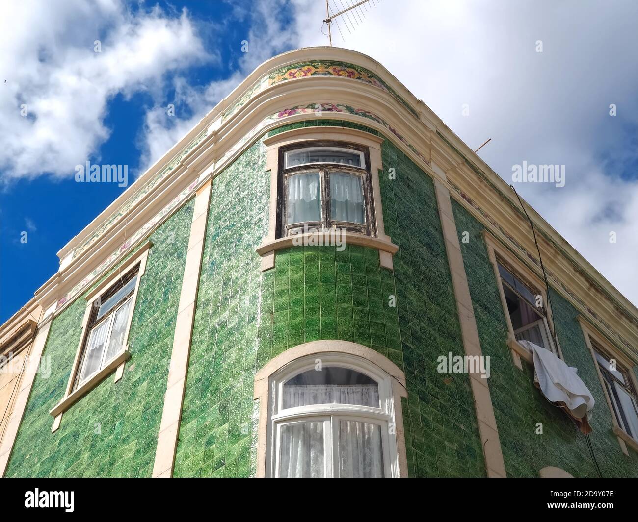 The beauty of Portugal - famous green tiled building in Lagos with ...