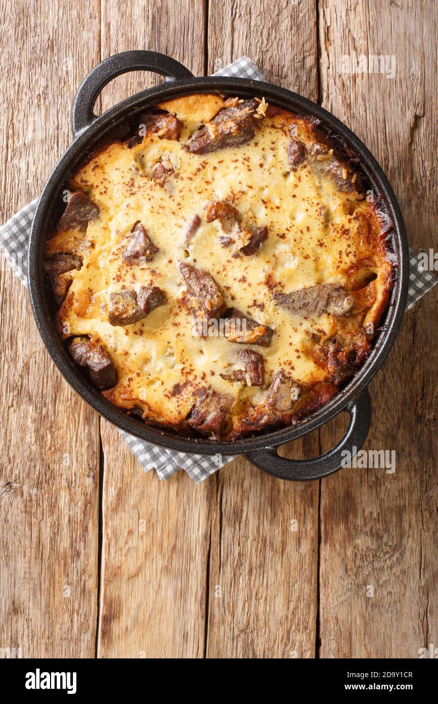 Albanian lamb and rice Tave kosi casserole baked with a mixture of ...