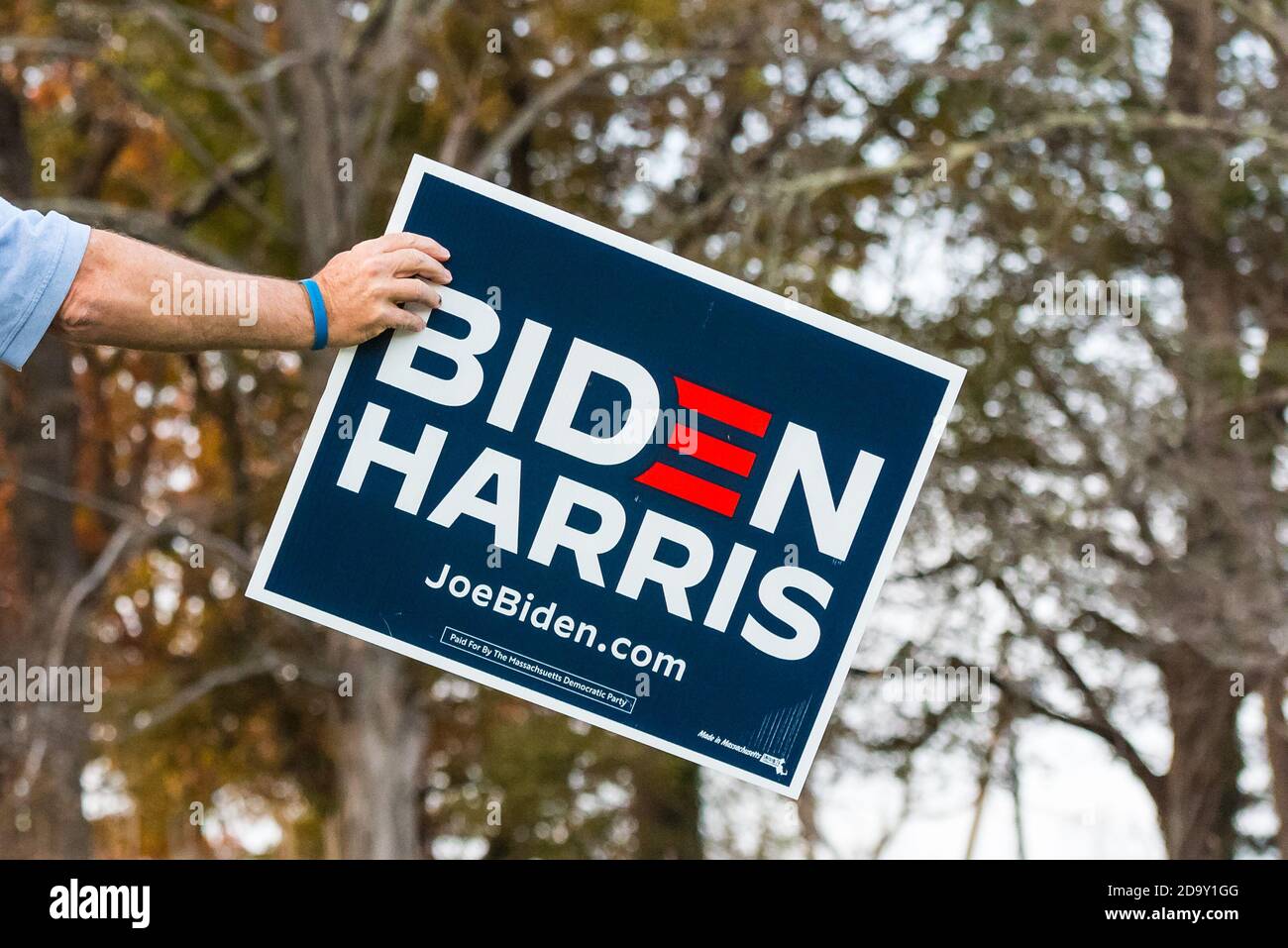 Hand holding a Biden Harris sign at a celebration for the 2020 Election ...