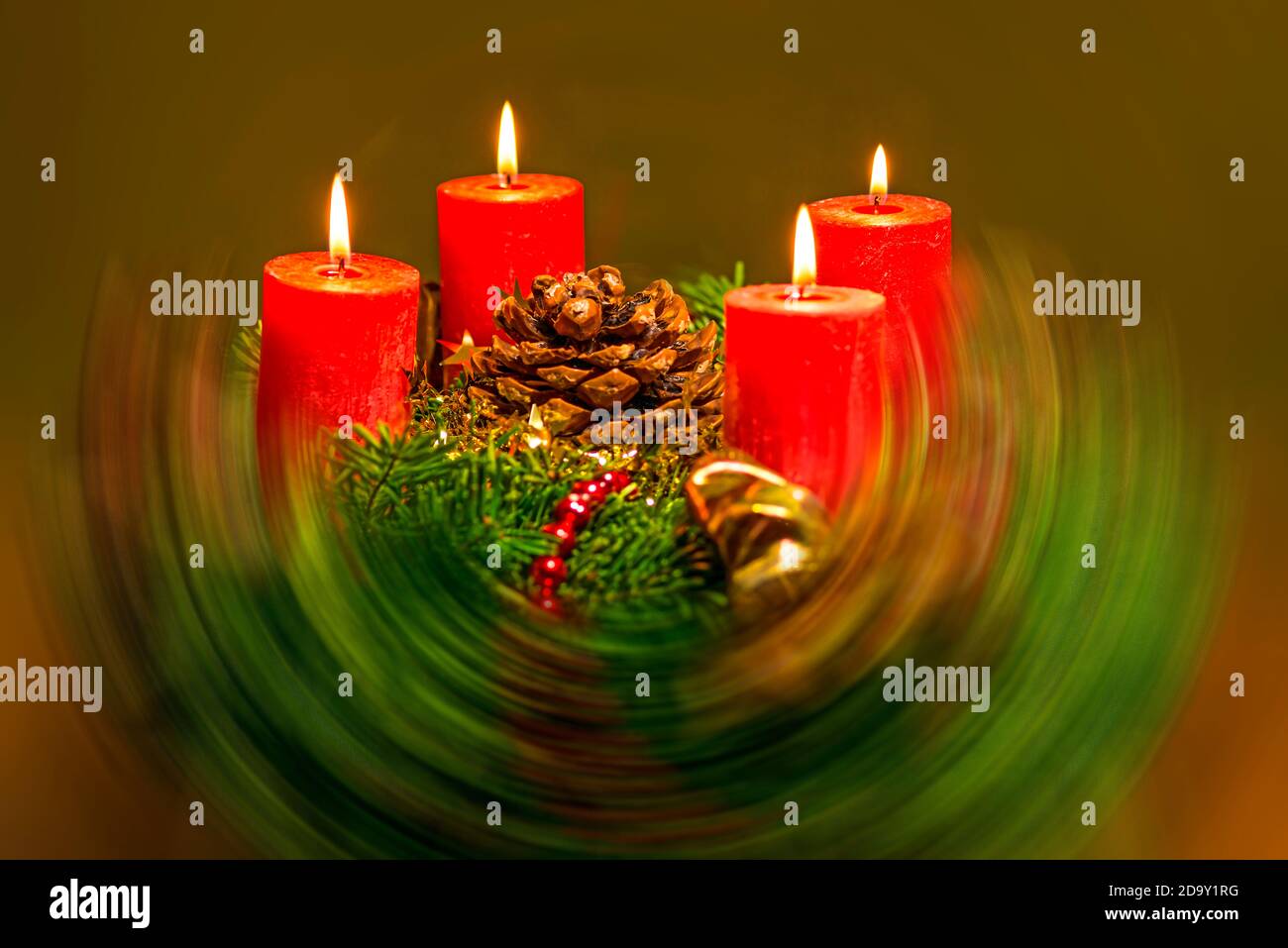 Advent wreath with burning candles with speed Stock Photo - Alamy