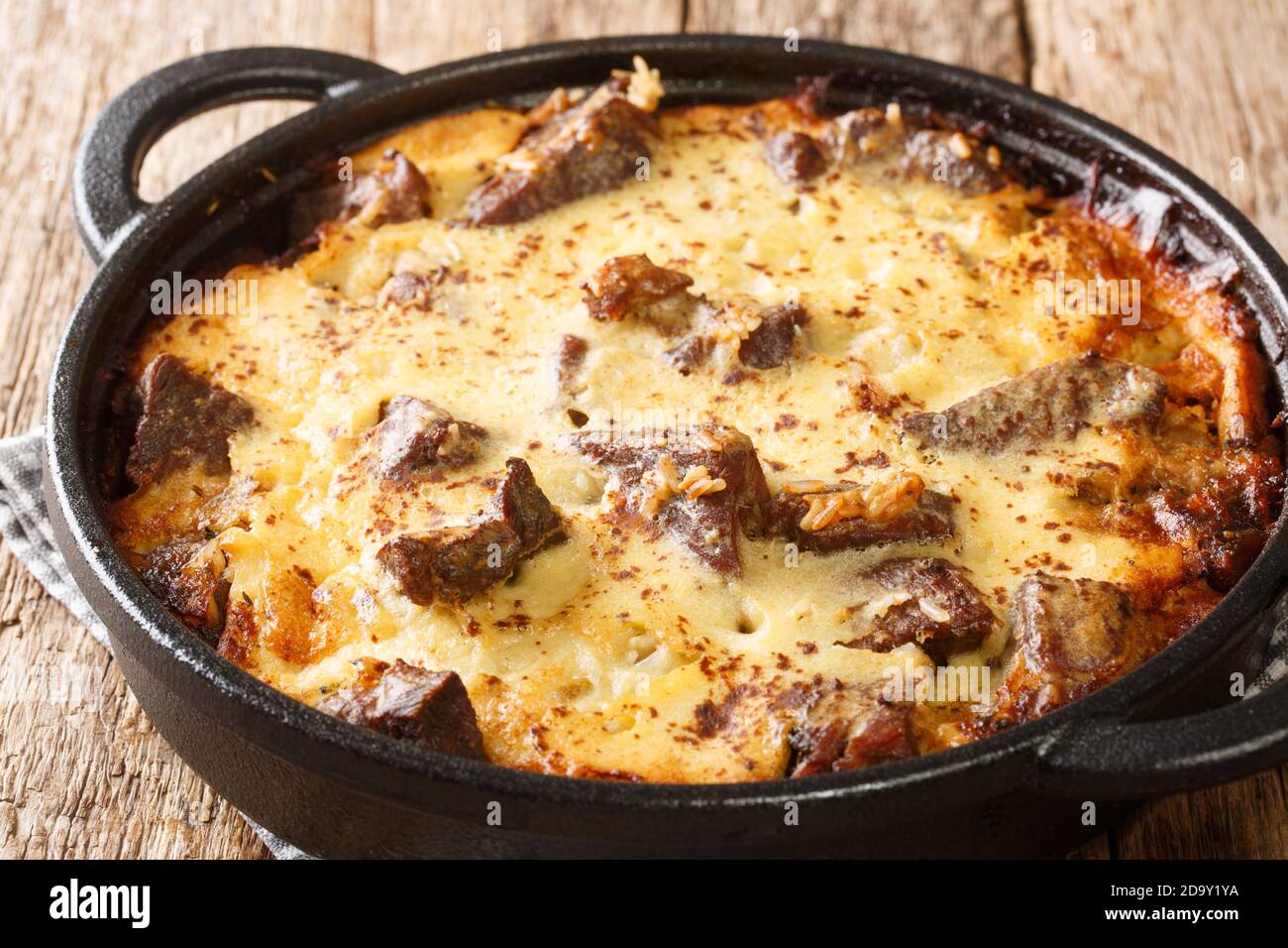 Tave kosi is a national Albanian dish of baked lamb and rice with ...