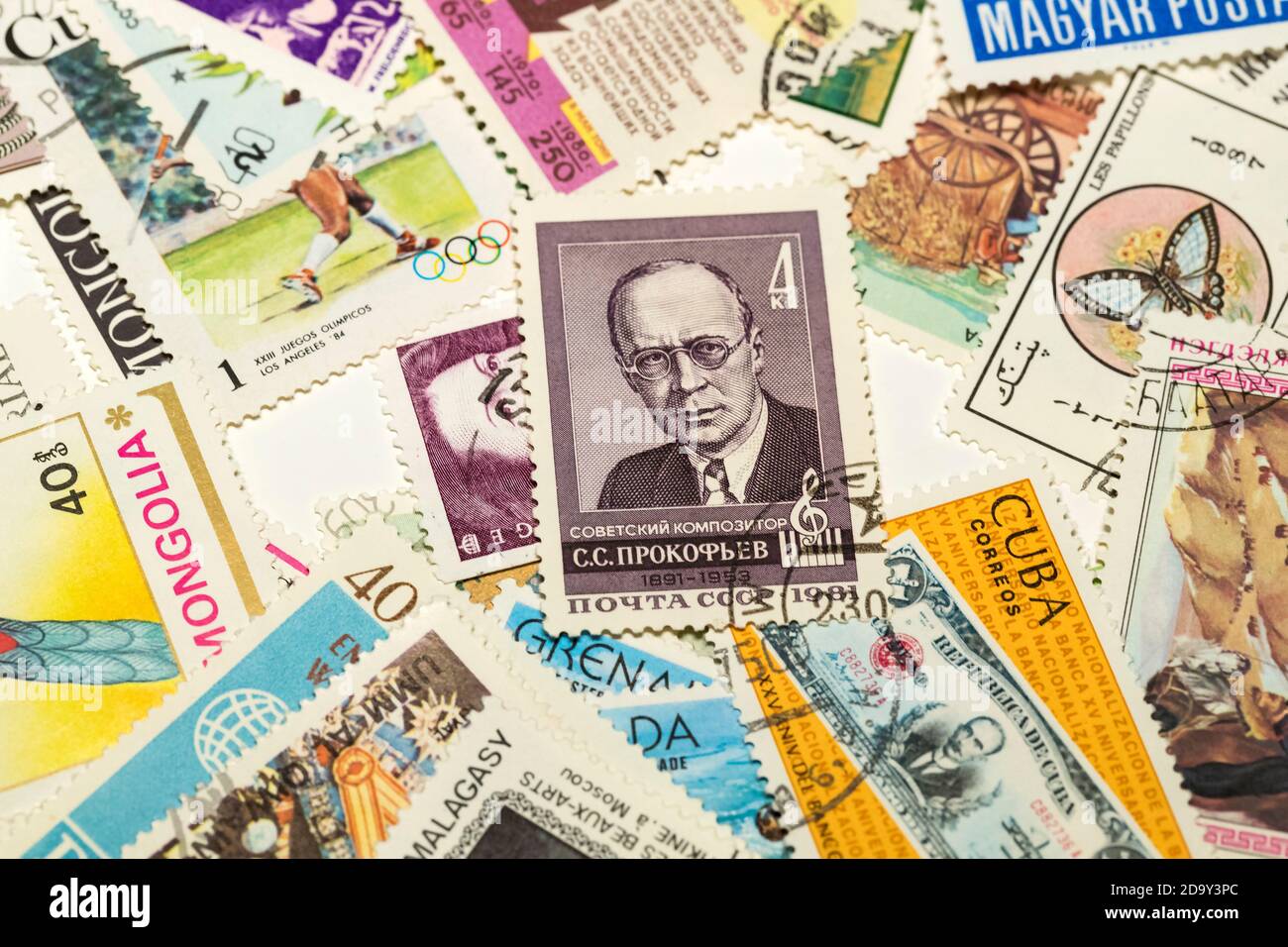 KHARKOV, UKRAINE - JUNE 23, 2020: Background of postage stamps used in ...