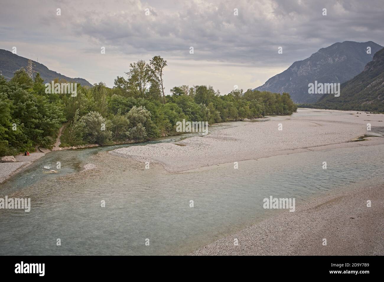 Venzone, Italy, August 2019. The Tagliamento river passes through the ...