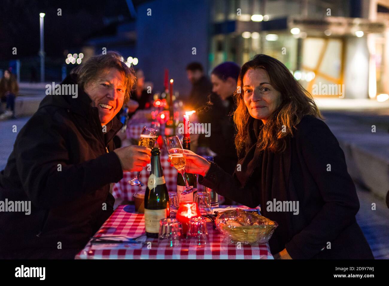 Chez Jules restaurant owner Pierre Levicky and staff serve couples a ...