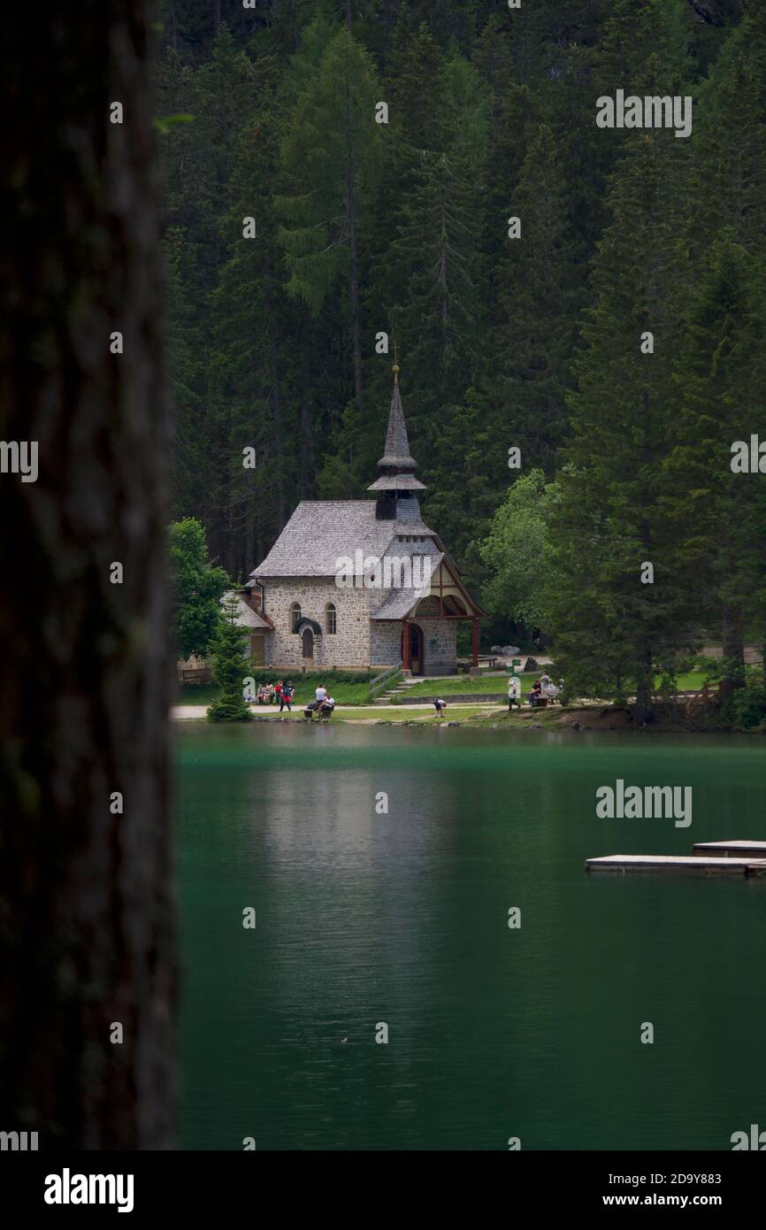 A church you can find in Braies lake, Italy Stock Photo - Alamy