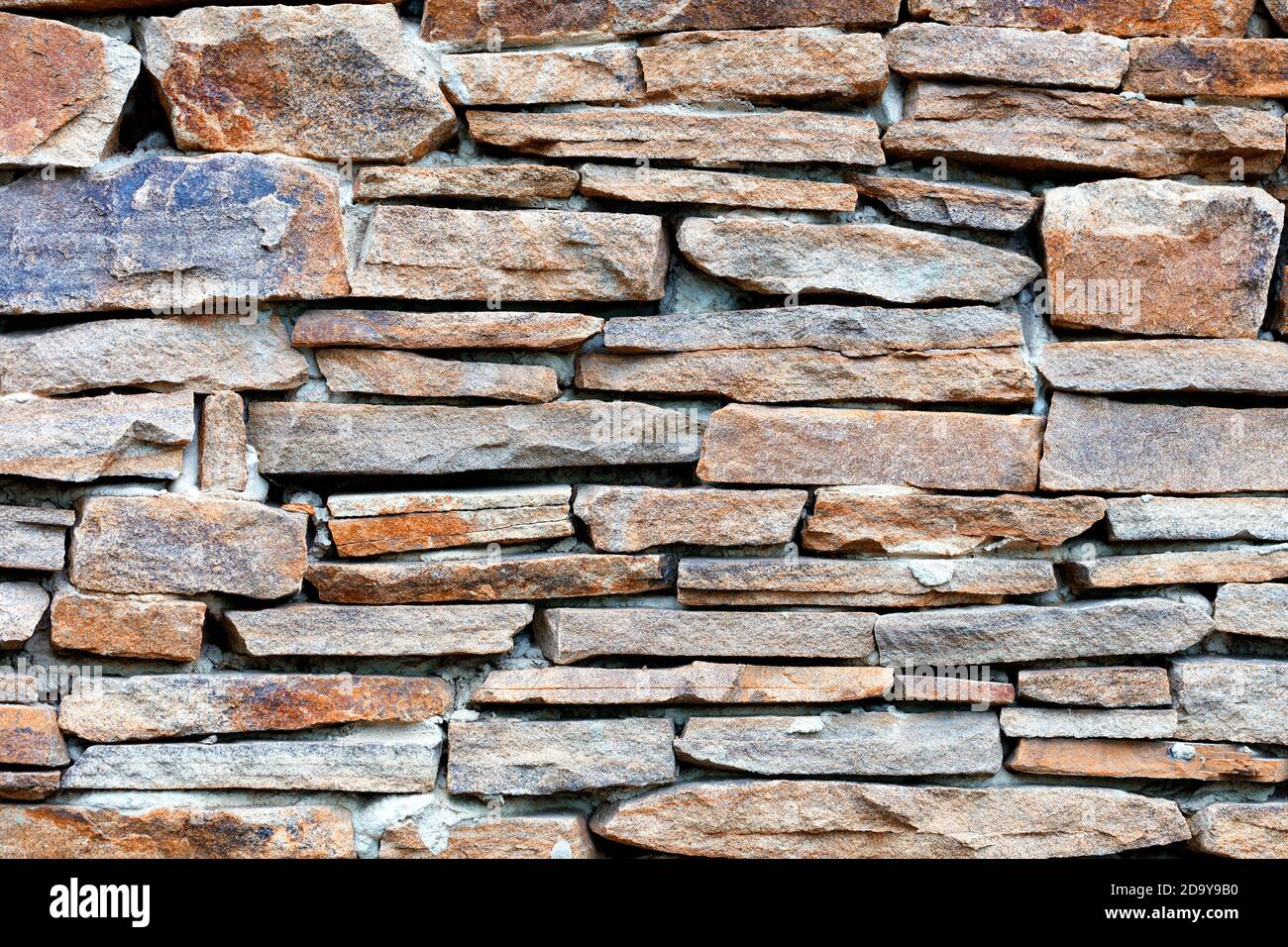 Part of a sandstone stone wall, expressive texture and background Stock ...
